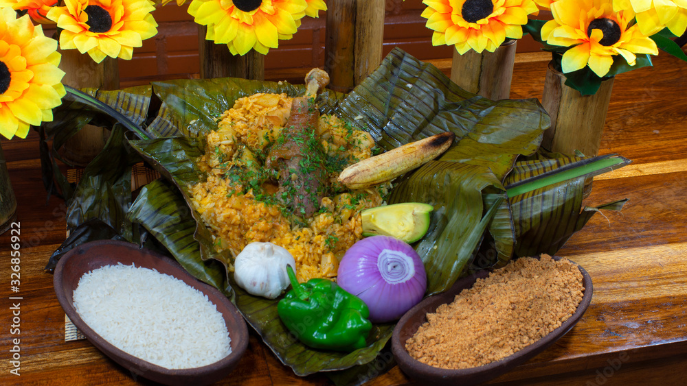 Tonga, typical food of the Ecuadorian coast, rice and meat cooked ...