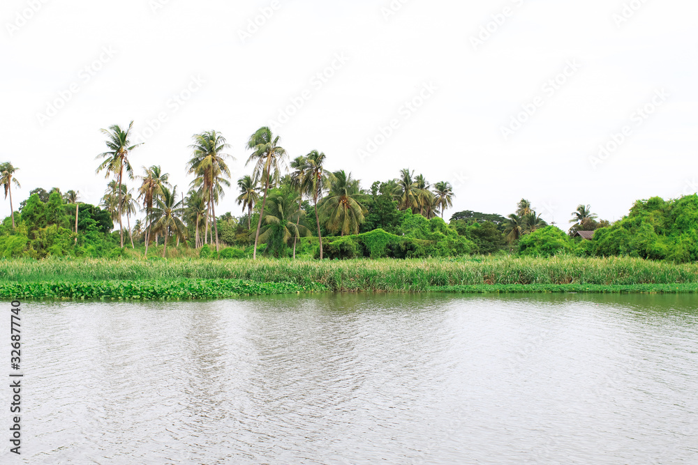 The Chao Praya river side view with housing village and terrace along ...