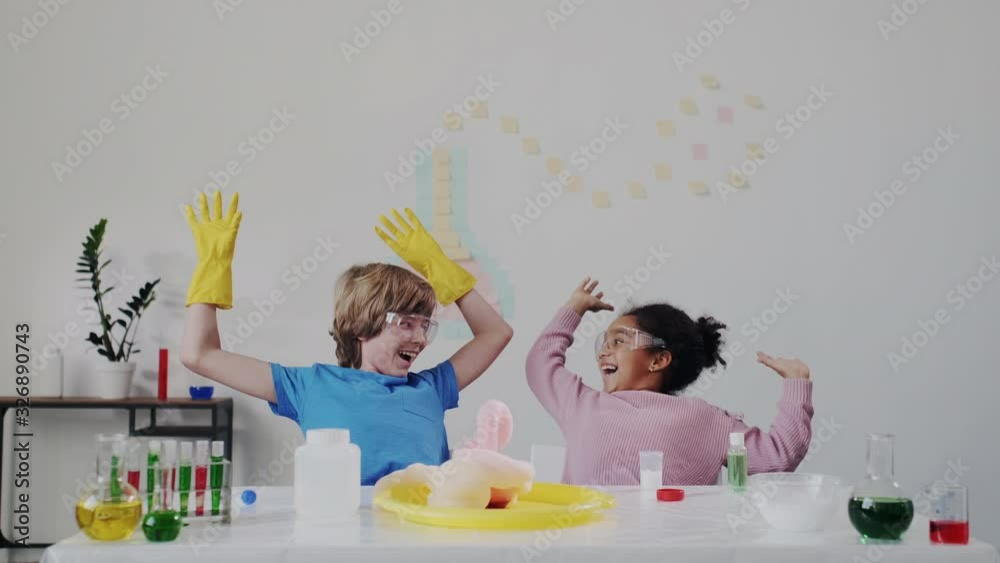 Vidéo Stock Crazy Kids in Chemical Laboratory. Blonde Boy with Yellow ...