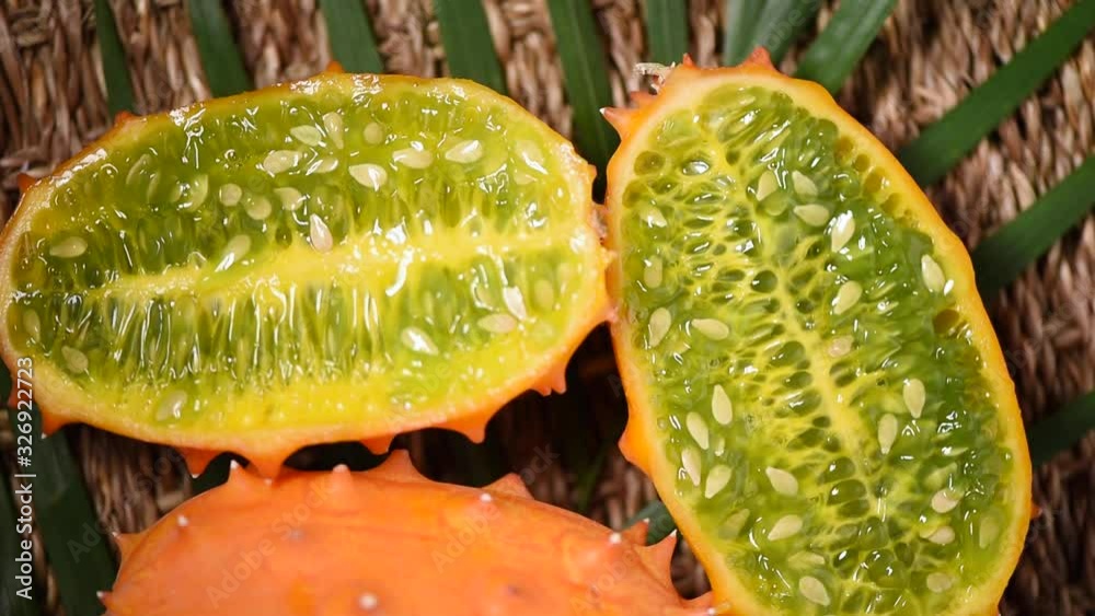 Cuted african horned melon on rotating background. Top view. Exotic ...