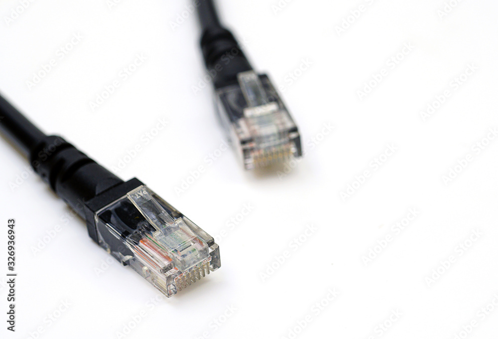 Closeup head UTP Cat6 cable black cladding color isolated on white with ...