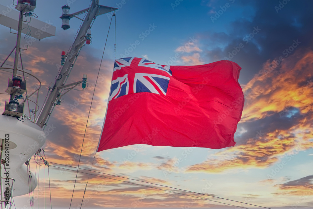 Red, white and blue flag British Navy flag blowing from mast on a ship ...