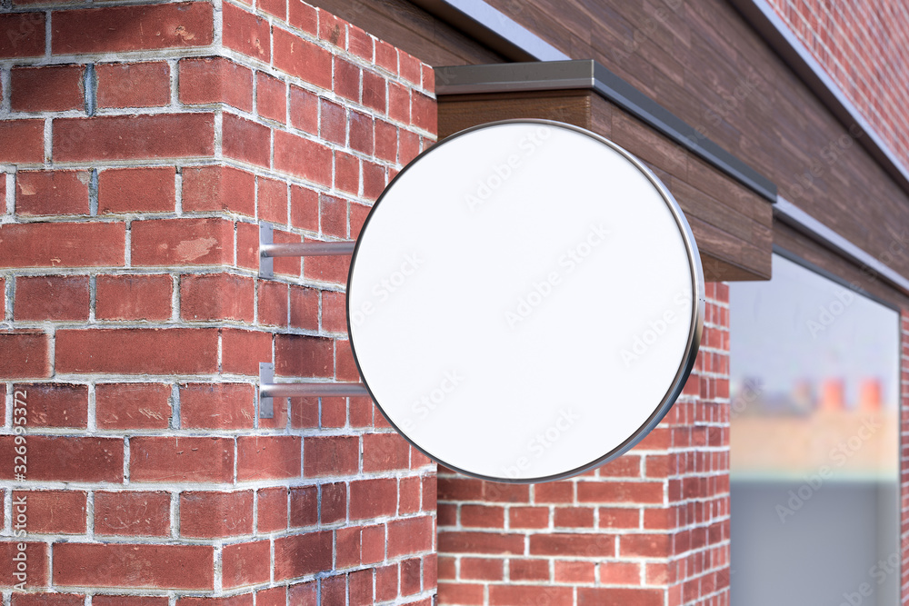 Round singboard or signage on the red brick wall with blank white sign ...