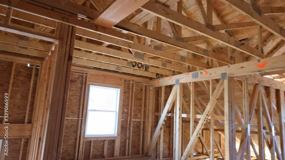 Beam built home under construction wooden truss, post and beam ...