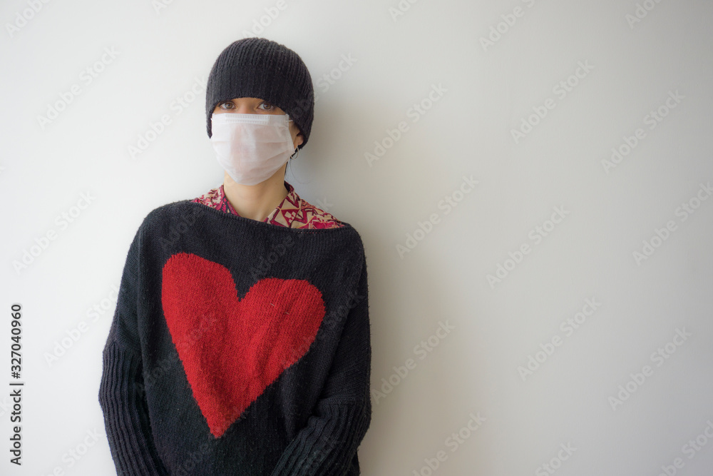 Young woman avoiding herself from Corono virus with a mask, isolated on ...