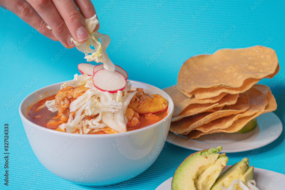 Delicious typical Mexican red Mexican pozole with tostadas Stock Photo ...