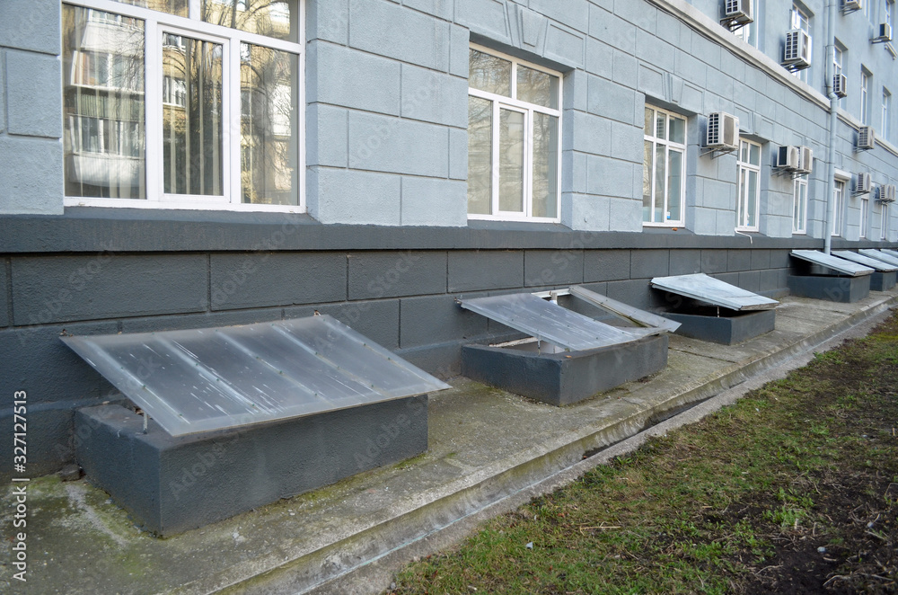 Mystery of Buried Cities.Poured windows lower floors of an old building ...