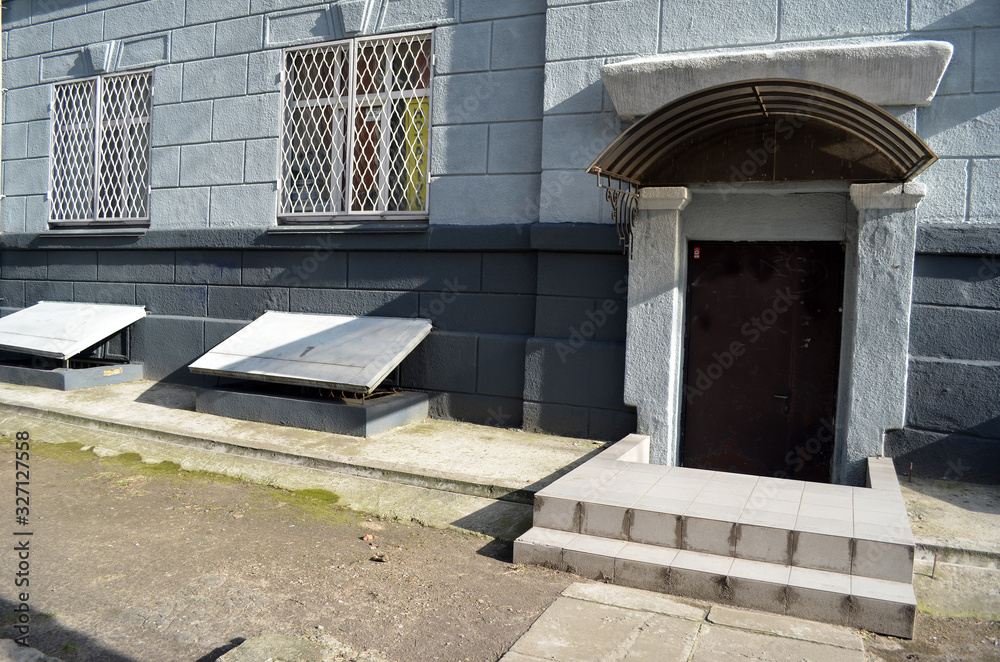Mystery of Buried Cities.Poured windows lower floors of an old building ...