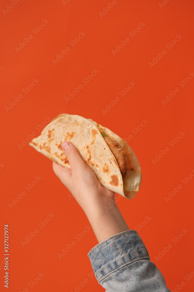 Mexican national food taco or Tatar national food kystyby in hand on an ...