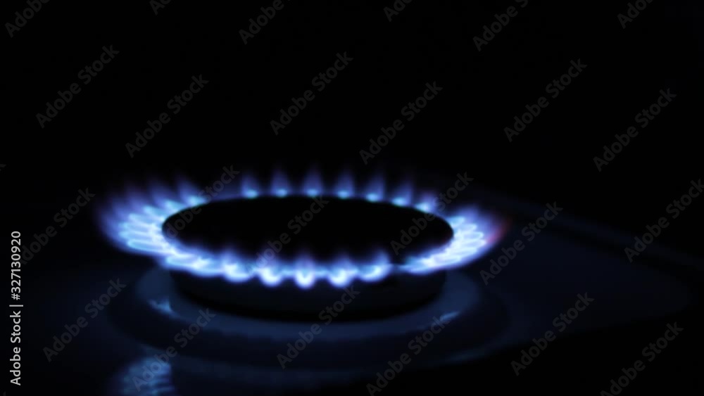ignition of gas on a burner, fire on a gas stove Stock Video | Adobe Stock