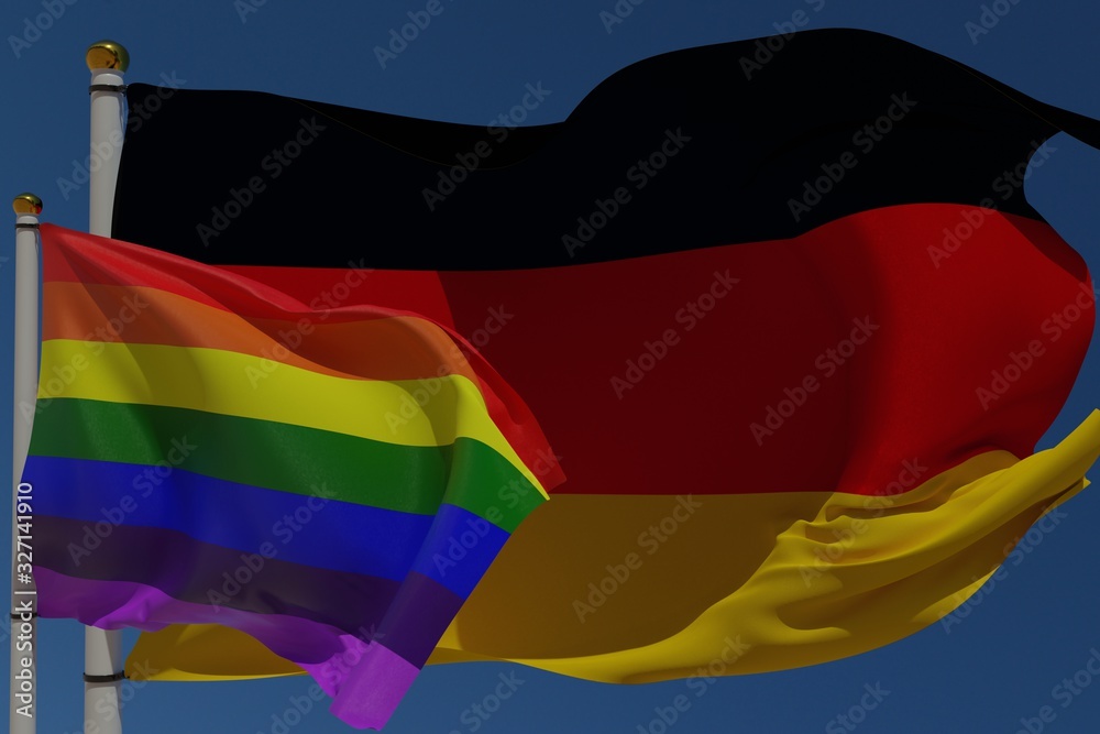 LGBT flag and German flag on a pole waving in the wind together ...