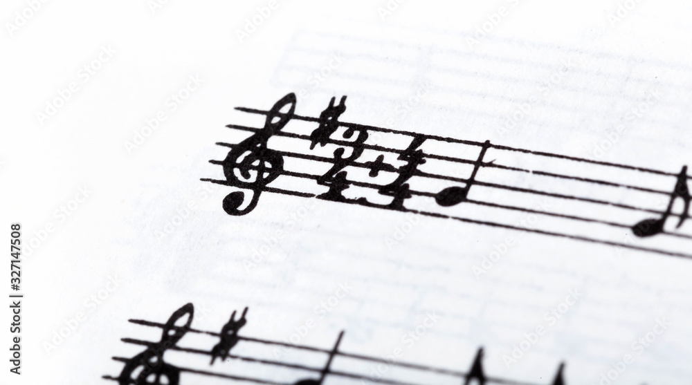 Key, double time signature symbol and violin clef. Musical notation ...