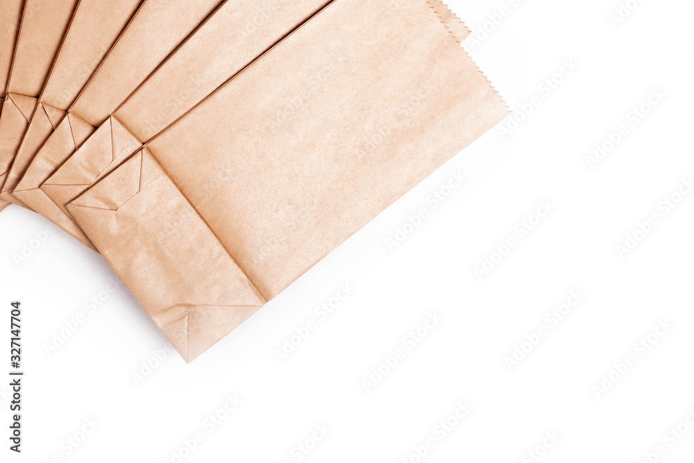A few simple small tiny eco friendly new disposable brown paper bags ...
