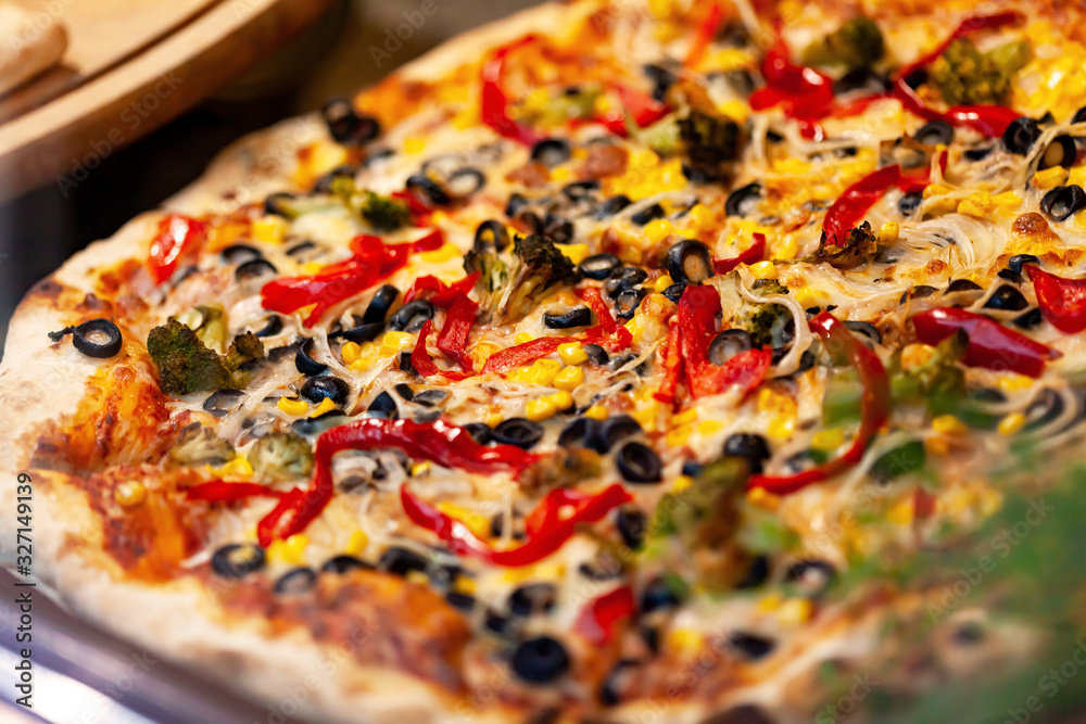 Traditional Italian pizza on thick crust background texture, shallow ...