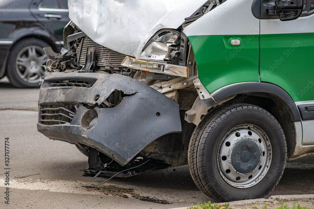 Heavily damaged car after car crash accident on a city street. Stock ...