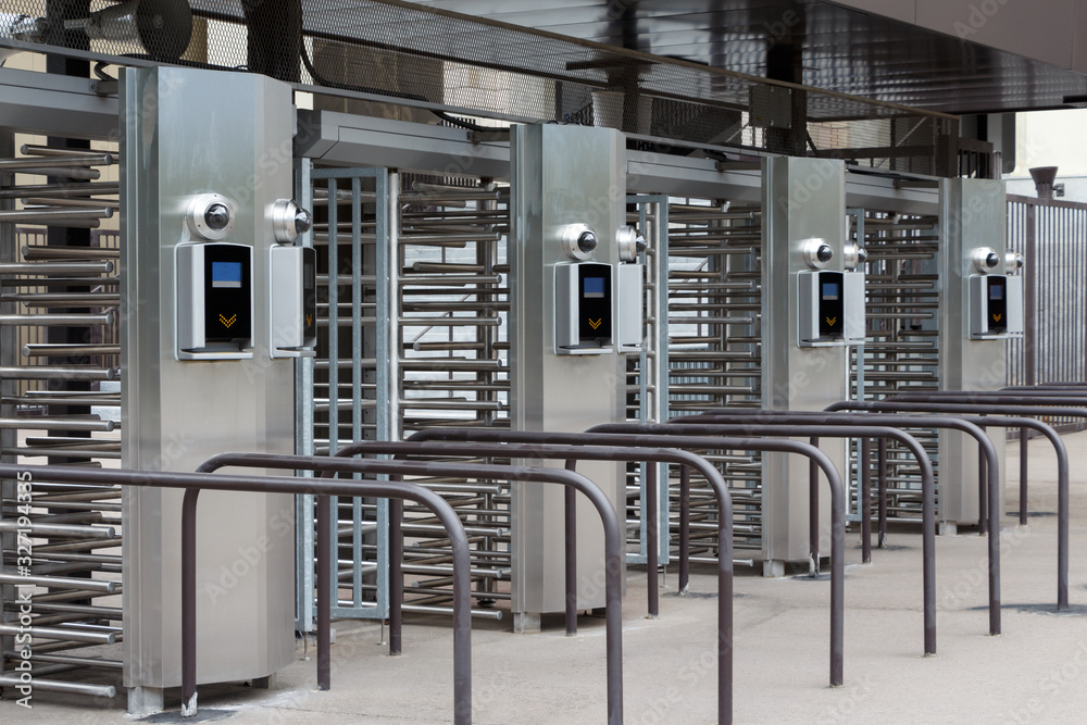 Modern turnstile at the stadium. Card access system, video surveillance ...