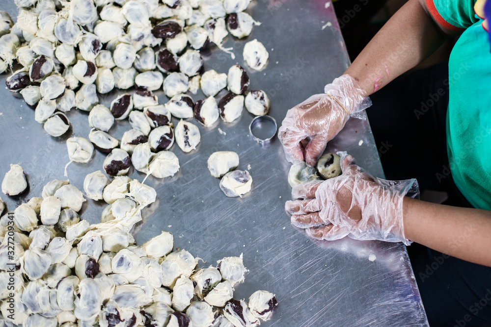 Worker Making bakpia kumbu hitam ( Red Bean) - Bakpia Pathok Jogja is ...
