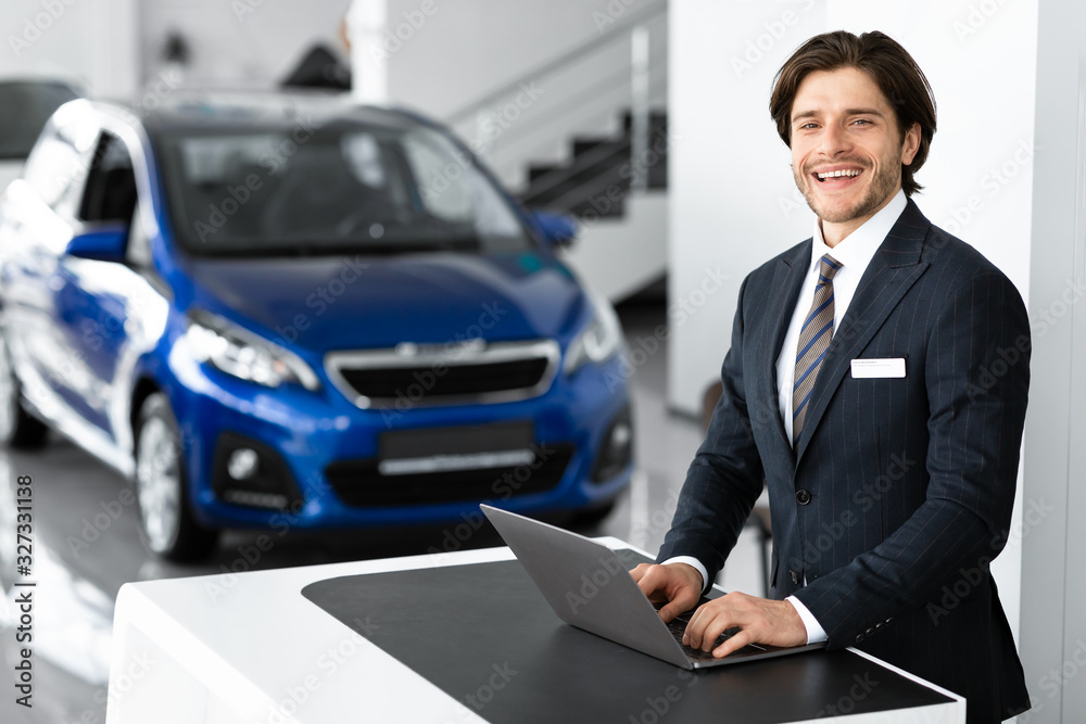 Car Sales Manager Standing In Luxury Dealership Office Stock Photo ...