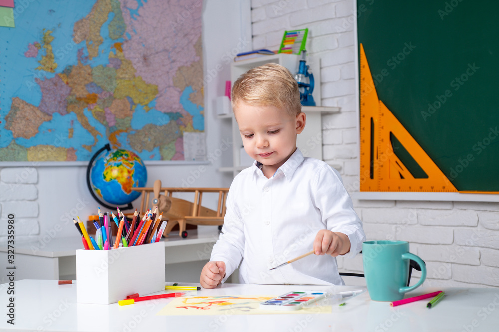 Portrait of Pupil 3 year old of primary school study indoors. School ...
