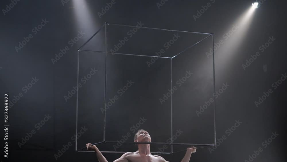 Vidéo Stock circus male muscular performer making tricks with juggling ...