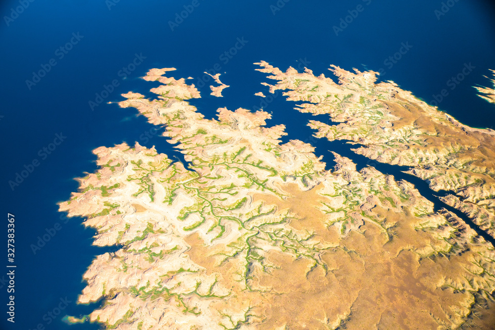 Aerial Photography of landforms over Nevada with Lake Mead in view ...