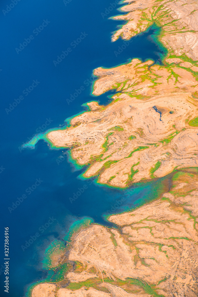 Aerial Photography of landforms over Nevada with Lake Mead in view ...