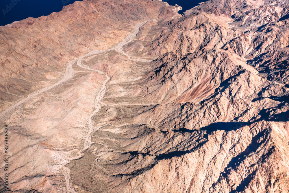 Aerial photography over western United States with landforms, mountains ...
