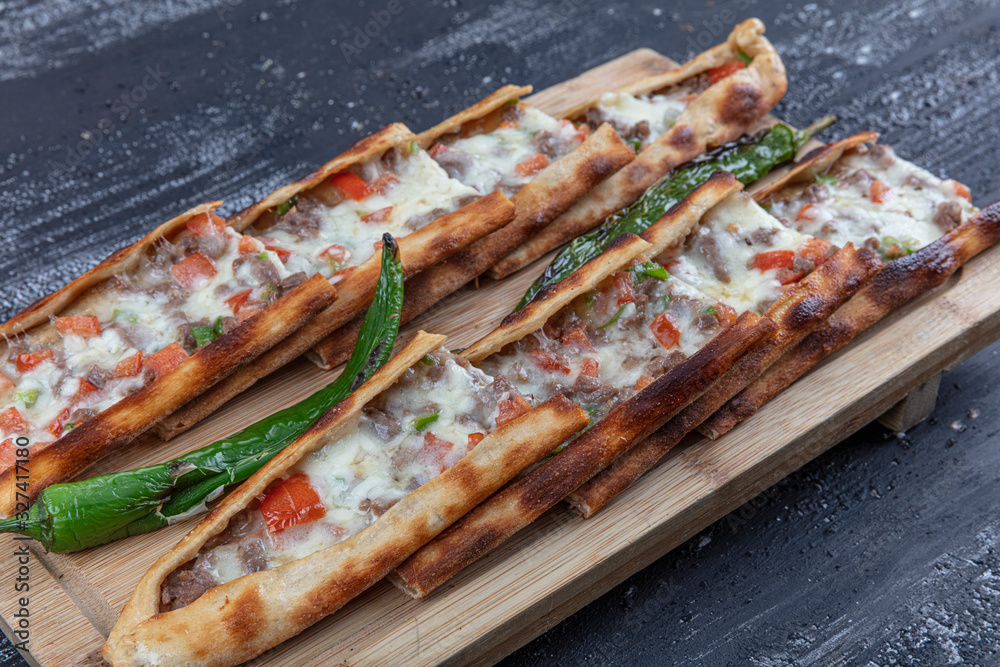 Turkish pide with flaked meat, kusbasi Pide. Traditional Turkish ...