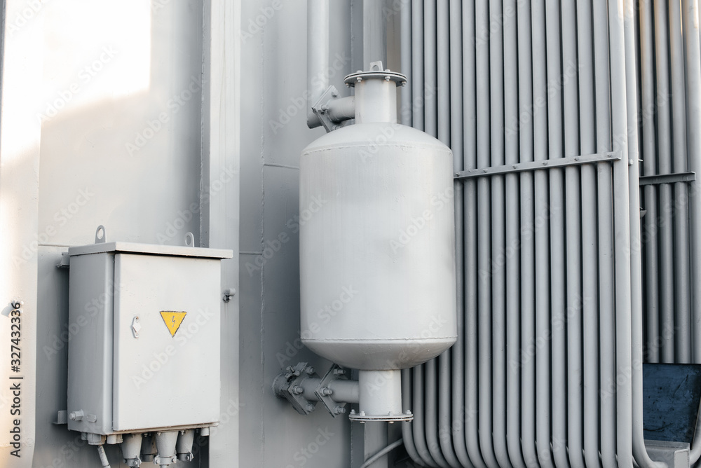 Expansion tank of a power transformer at an electrical substation ...
