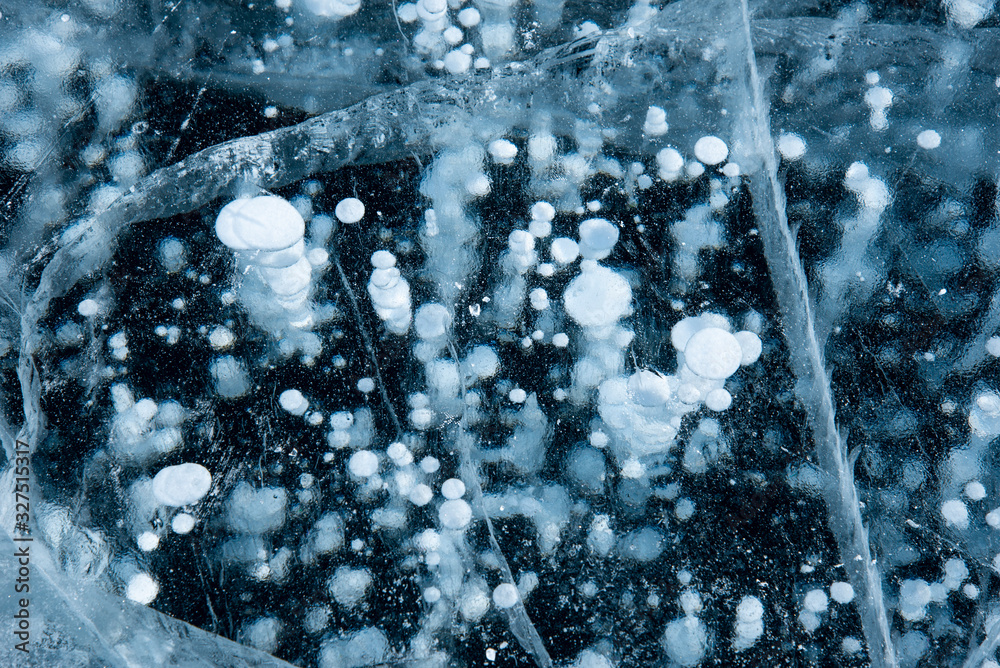 Methane Bubbles in the Baikal Ice.ice and cracks on the surface of Lake ...