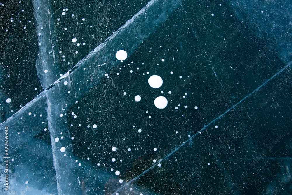 Methane Bubbles in the Baikal Ice.ice and cracks on the surface of Lake ...
