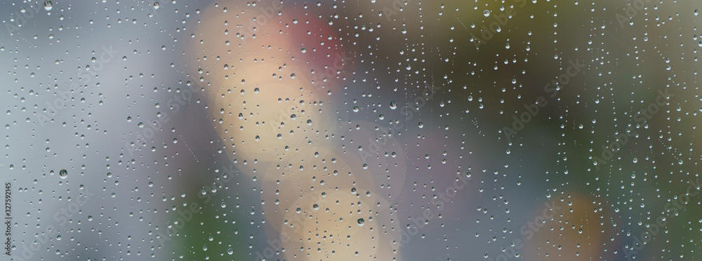 Defocused photography of city street lights in rainy sunset. Concepts ...