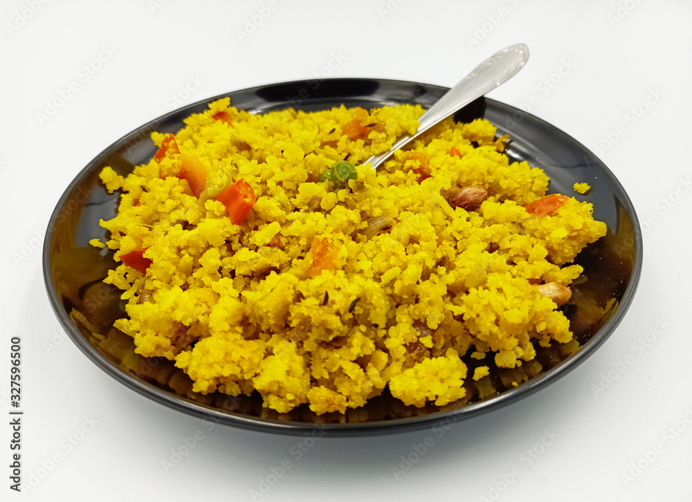 healthy poha dish in black plate Stock Photo | Adobe Stock