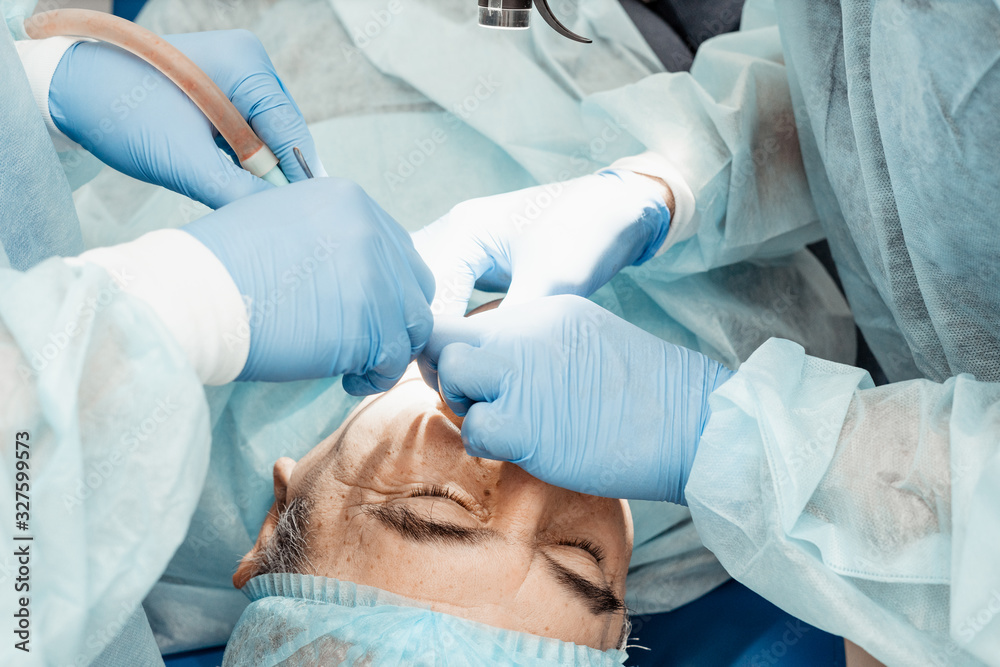Dentists will perform an operation, implant placement. Real operation ...