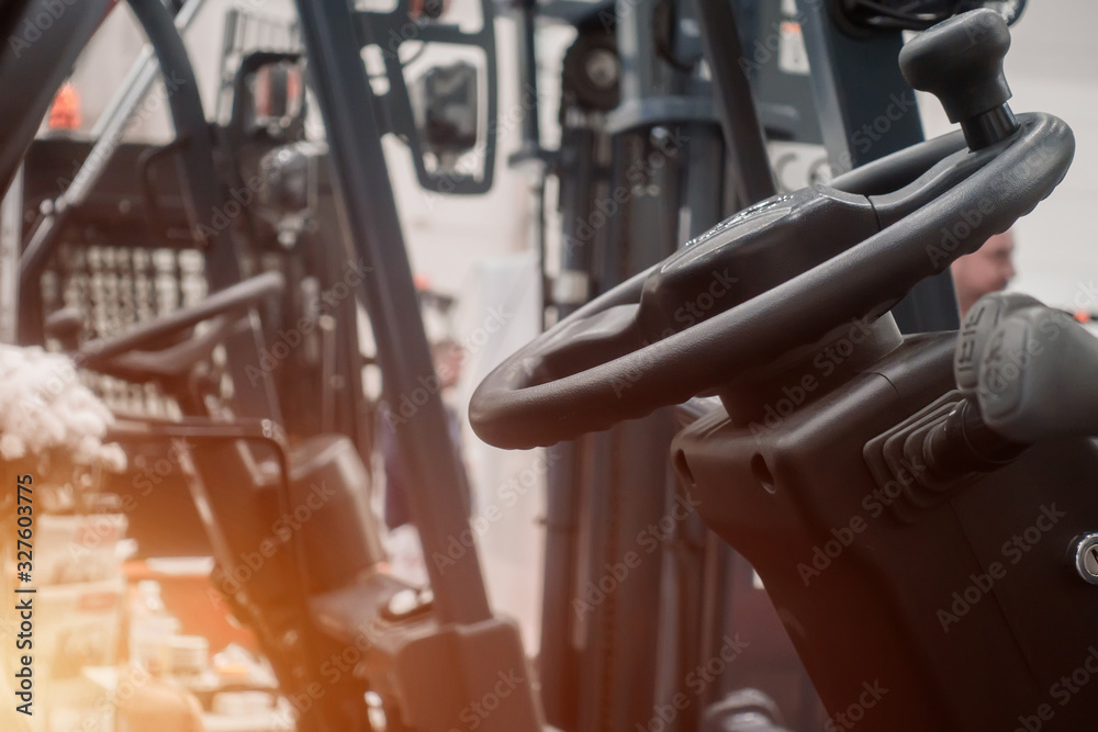 Forklift steering wheel and levers Stock Photo | Adobe Stock