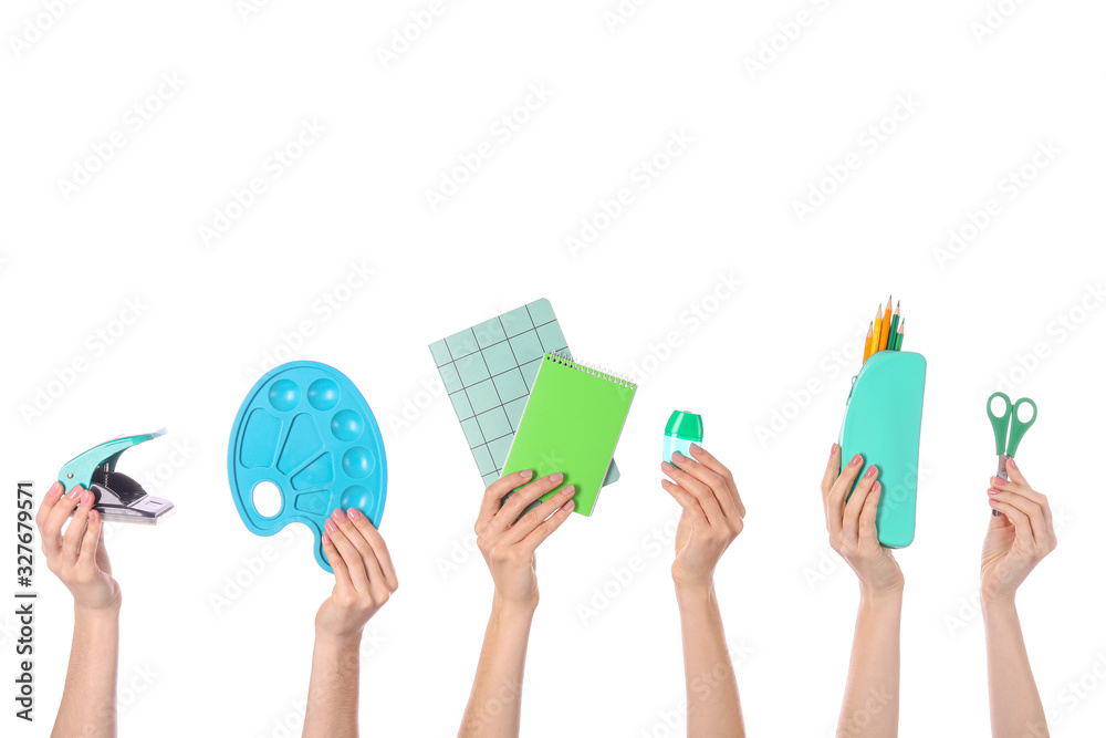 Many hands with school supplies on white background Stock Photo | Adobe ...