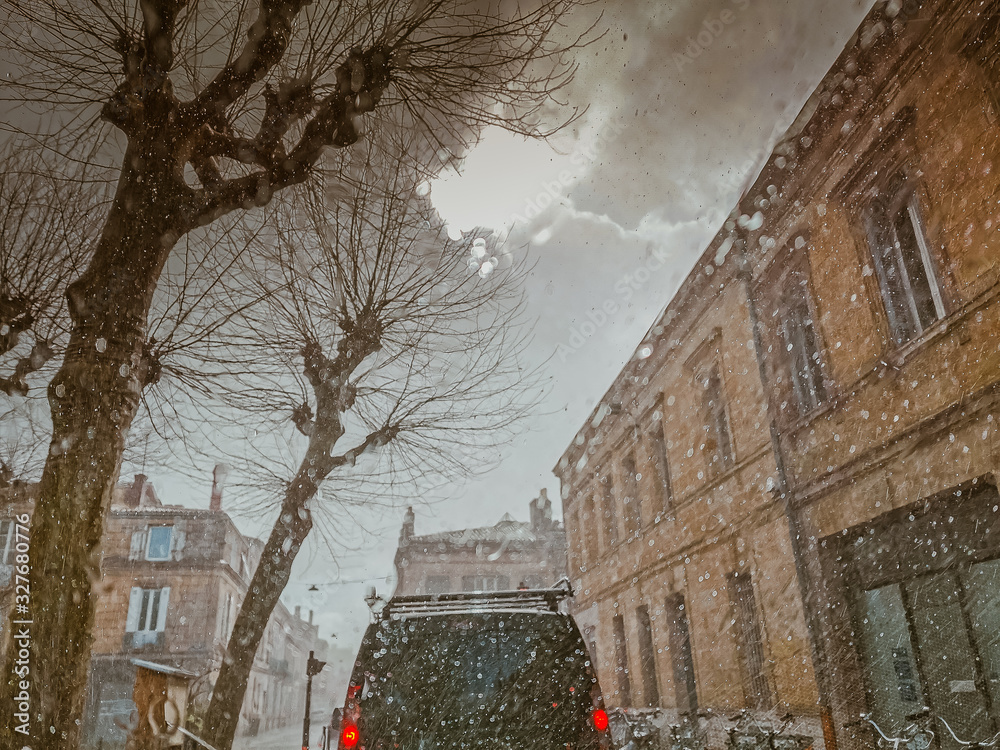 Blurred view from car windscreen during spectacular storm with heavy ...