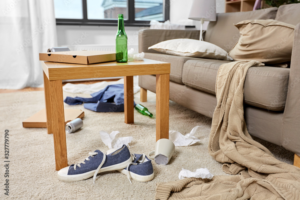 mess, disorder and interior concept - view of messy home living room ...