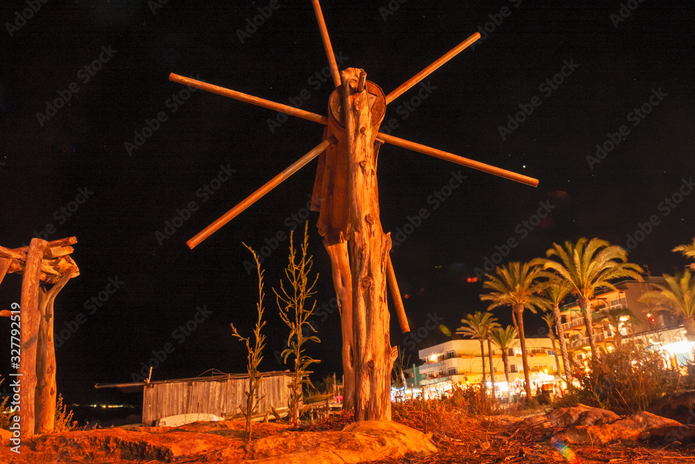 Night view of boats pulled ashore in a port of a fishing village in ...
