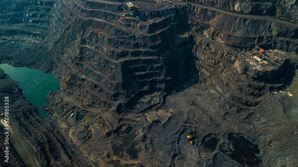 An open-cast mine quarry using an open-pit mining of ore type according ...