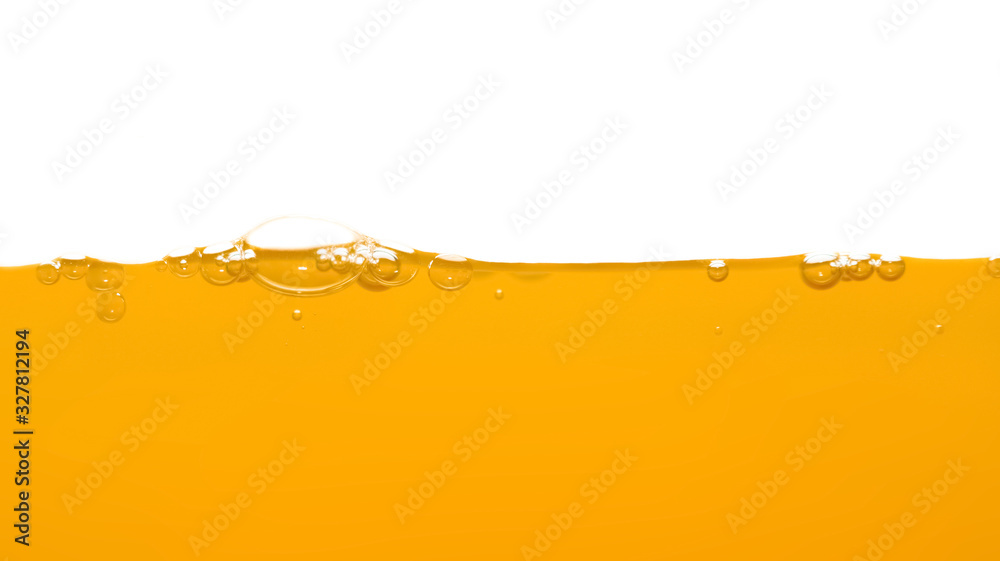 Orange water surface with bubble and water splash on white background ...