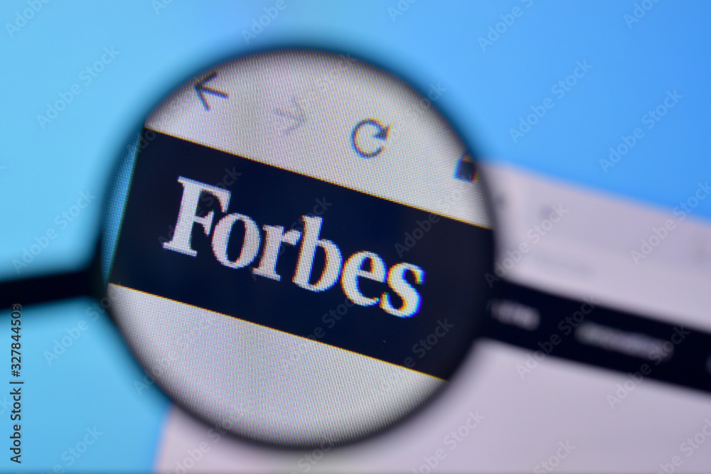 Homepage of forbes website on the display of PC, url - forbes.com. foto ...