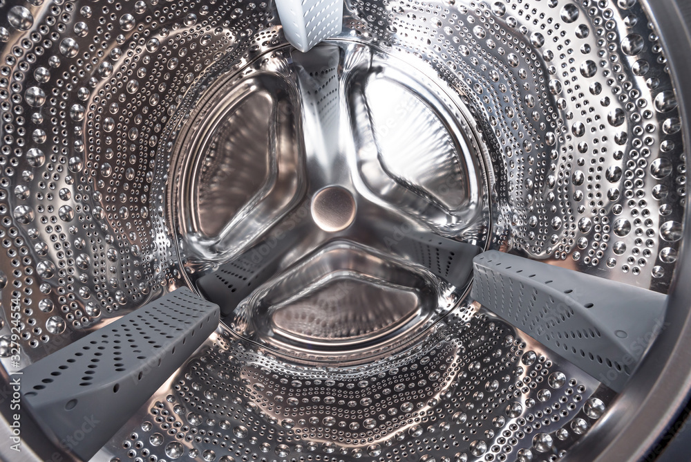 Inside of a washing machine drum Stock Photo | Adobe Stock