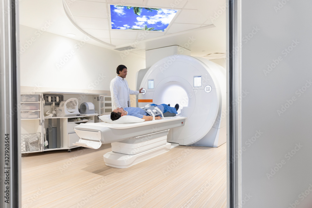Radiology technologist preparing patient for MRI scan Stock Photo ... Radiology technologist preparing patient for MRI scan Stock Photo ...