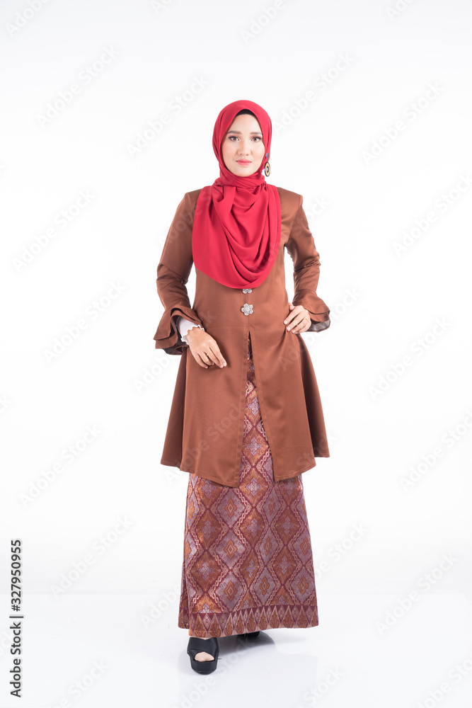 Full length portrait of a beautiful female model wearing a modern ...