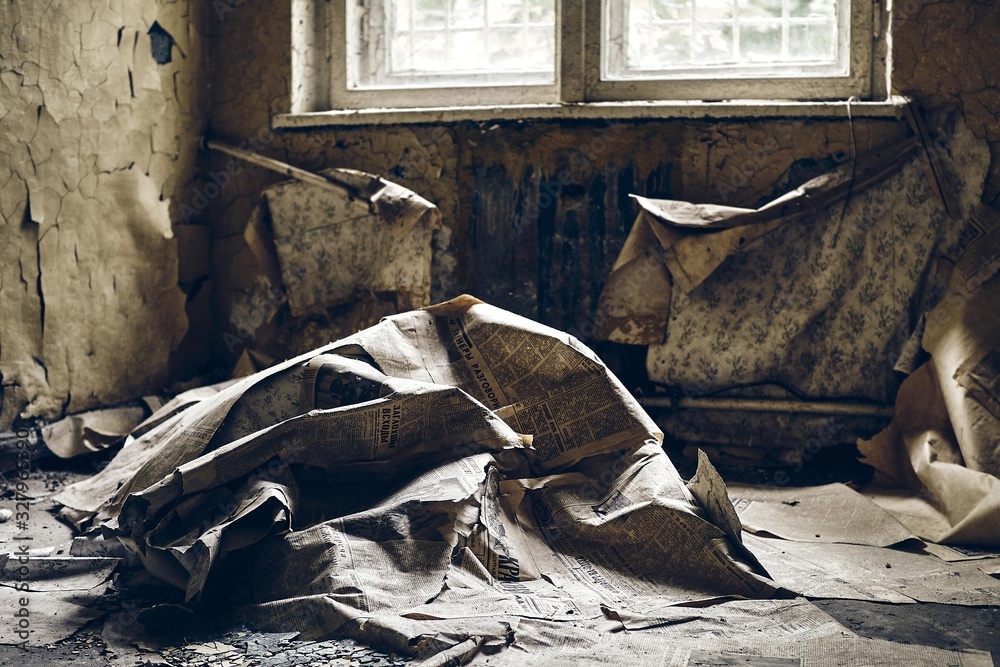 Old dusty room with a window weathered walls and old newspapers Stock ...