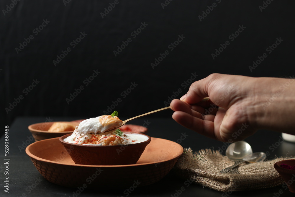 Dahi vada (Deep fried balls served with curd), thandai are well known ...