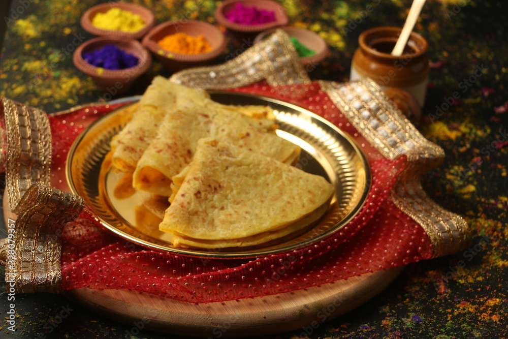 PopuIndian sweet bread known as Puran poli (Gram floor and jaggery ...