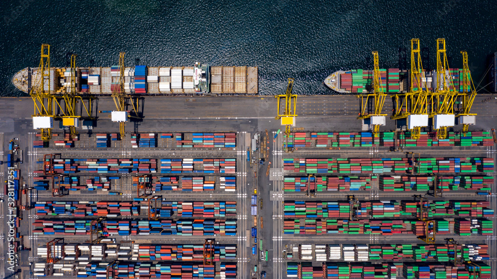Container ship loading and unloading in deep sea port, Aerial view of ...