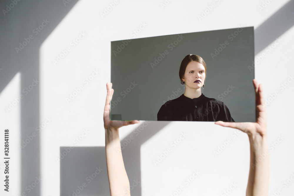 Portrait in mirror. Stock Photo | Adobe Stock